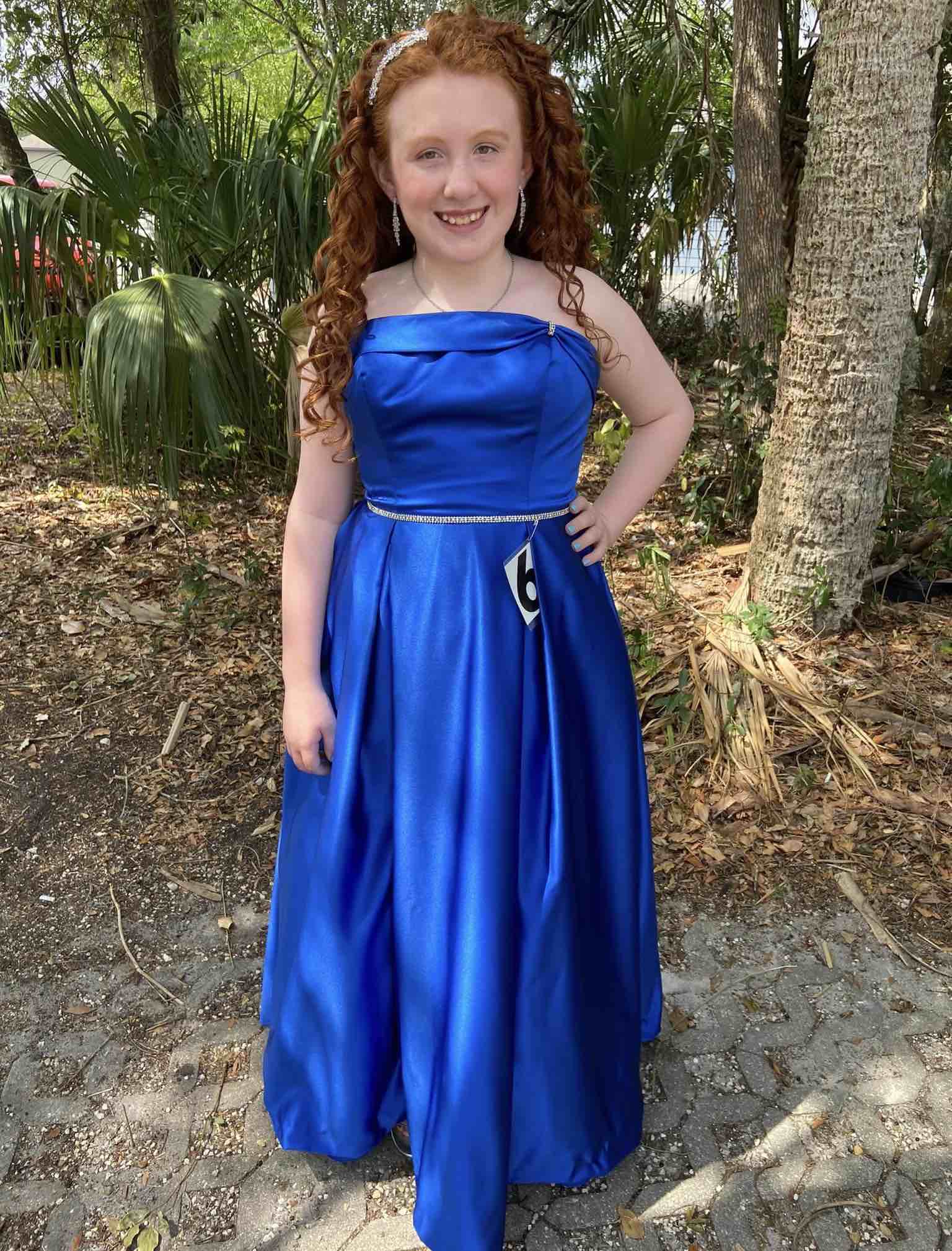 This 12-year-old made a formal wear charity to empower her peers in ...