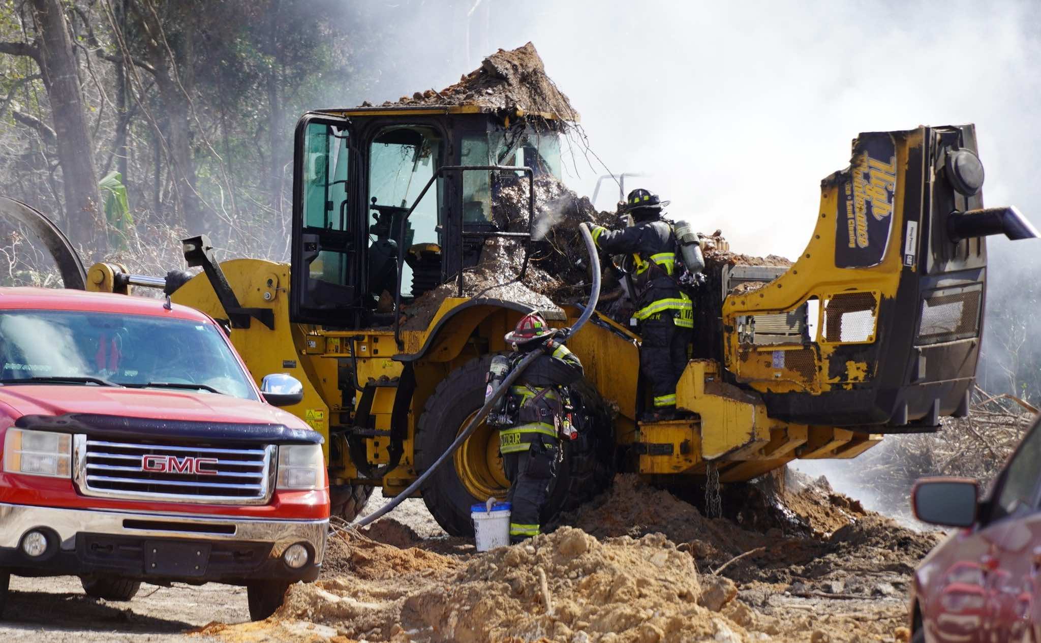 Ocala firefighters extinguish front-end loader engine fire - Ocala-News.com